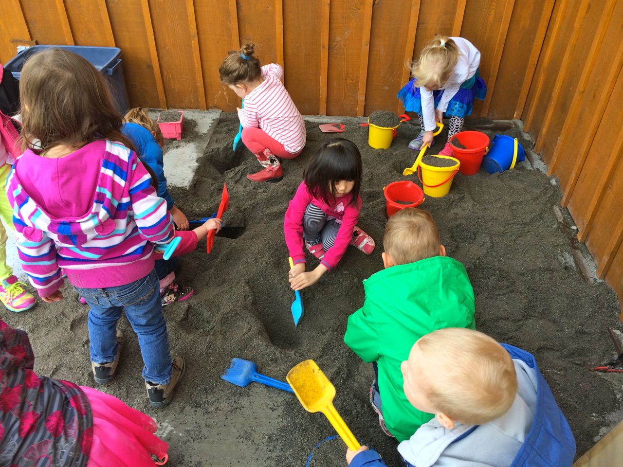 The sandbox is popular. | Canmore Preschool